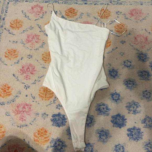 Showpo. | Tops | Asymmetrical Bodysuit | Poshmark